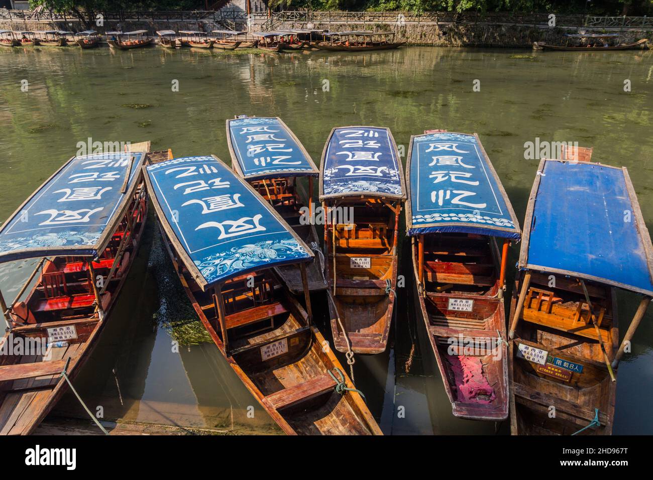 FENGHUANG, CHINA - AUGUST 14, 2018: Boats at Tuo river in Fenghuang ...