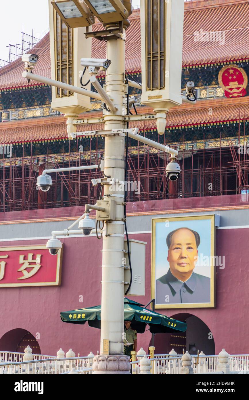 BEIJING, CHINA - AUGUST 28, 2018: Surveillance cameras and Mao Zedong ...