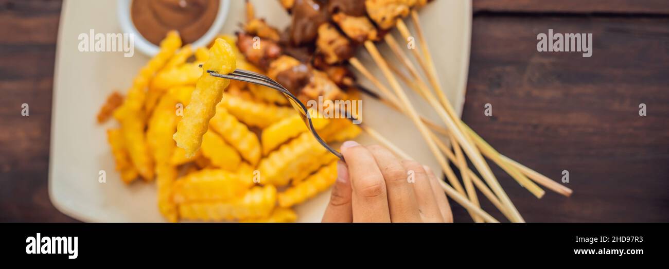 Chicken satay served with peanut sauce and french fries Bali, Lifestyle ...