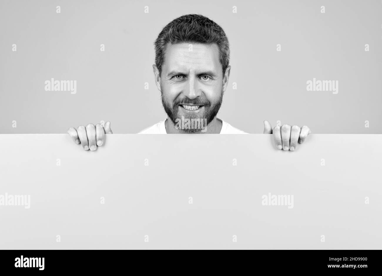 happy man with copy space for advertisement. guy advertising ...