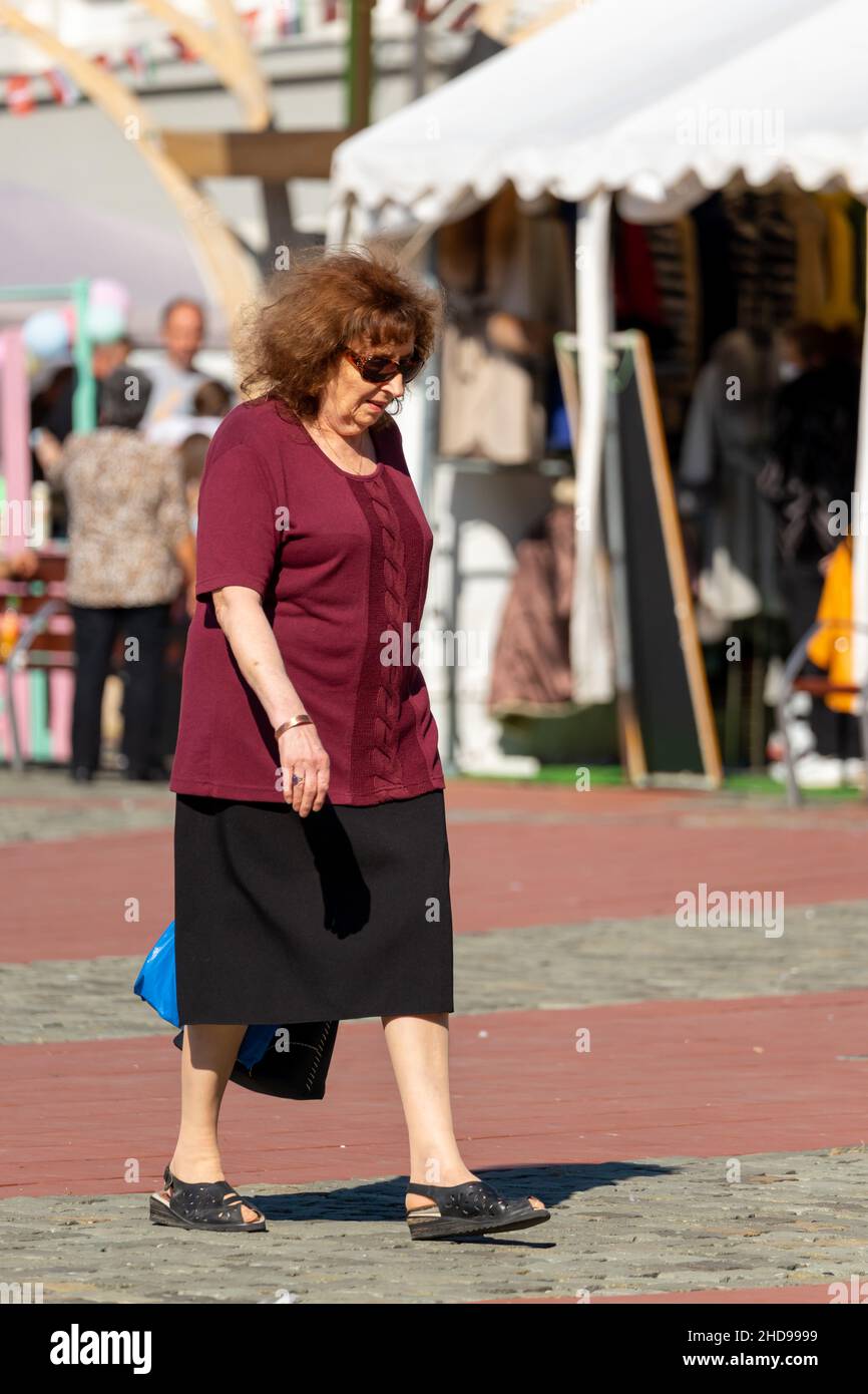 Timisoara, Romania - September 25, 2021: Woman walking on the street ...