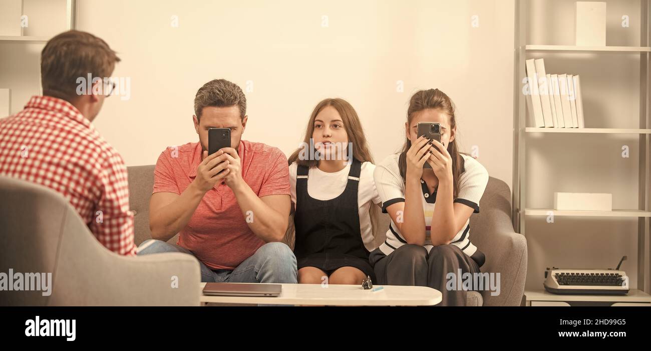 phone addicted father mother and child at family psychologist ...