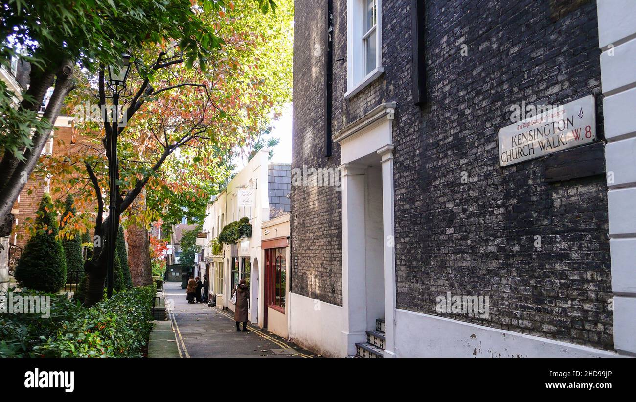 Shops and shoppers on Kensington Church Walk, London, W8, England, U.K ...