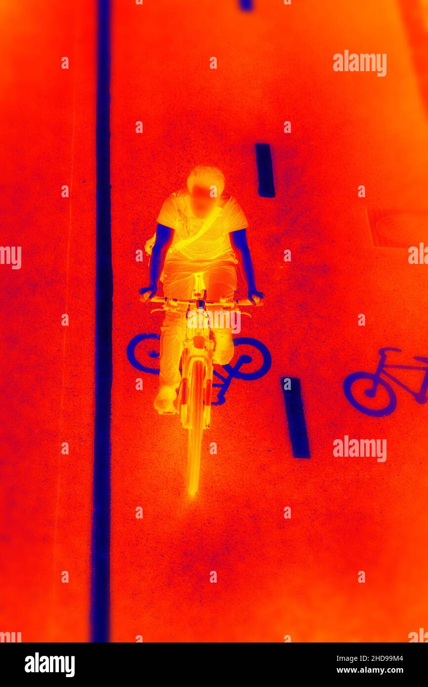 Blurred unrecognizable person. Thermal profile of cyclist with normal ...