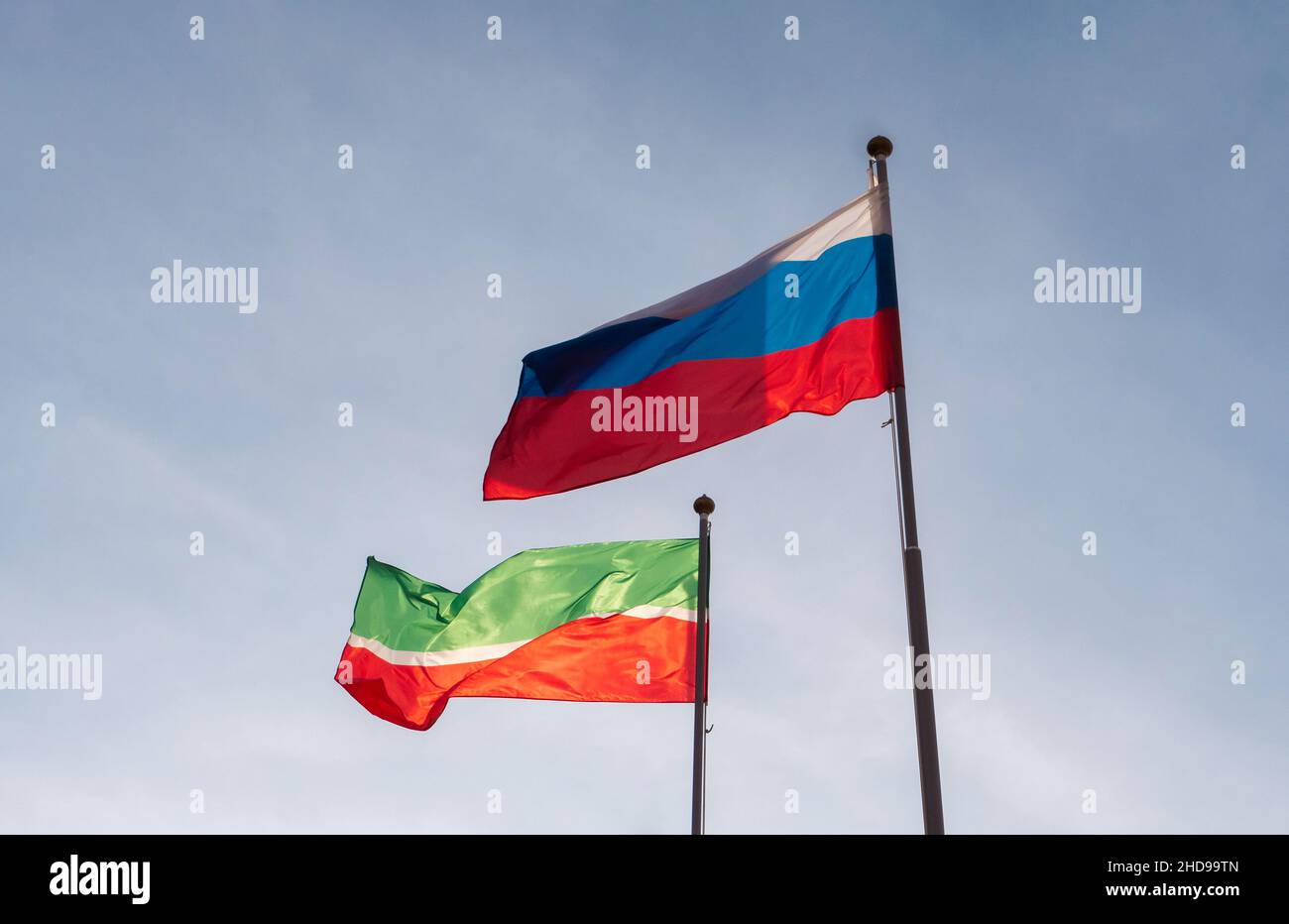 Flag of Russia and flag of the Republic of Tatarstan against the sky ...