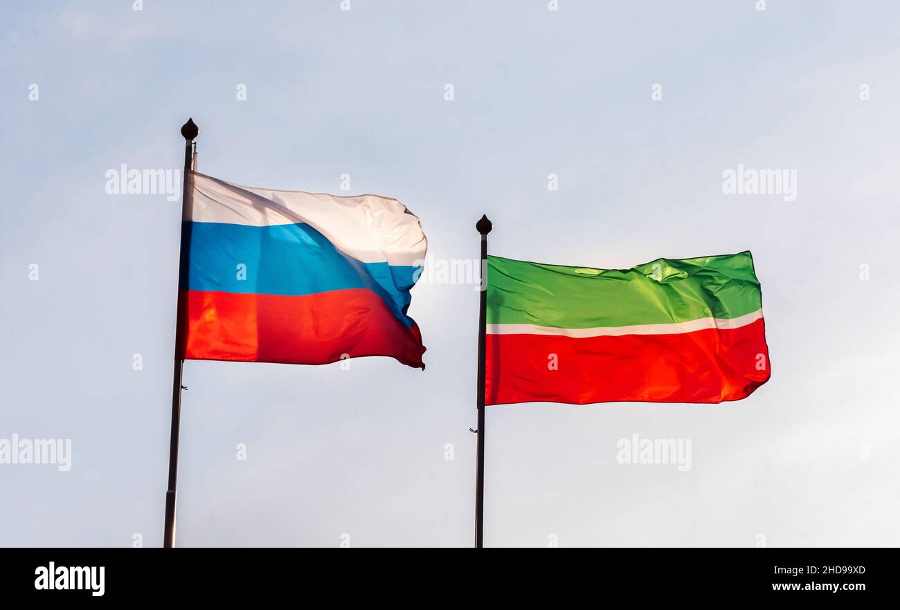 Flag of Russia and flag of the Republic of Tatarstan against the sky ...