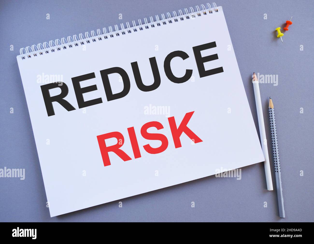 Handwriting text Reduce Risk. Concept meaning lessen the potential ...