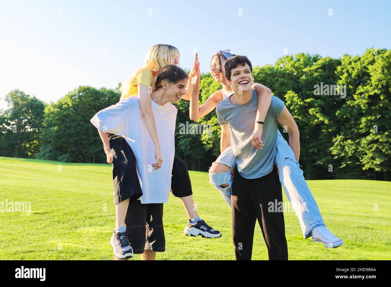Teenage youth having fun in the park, happy laughing friends Stock ...