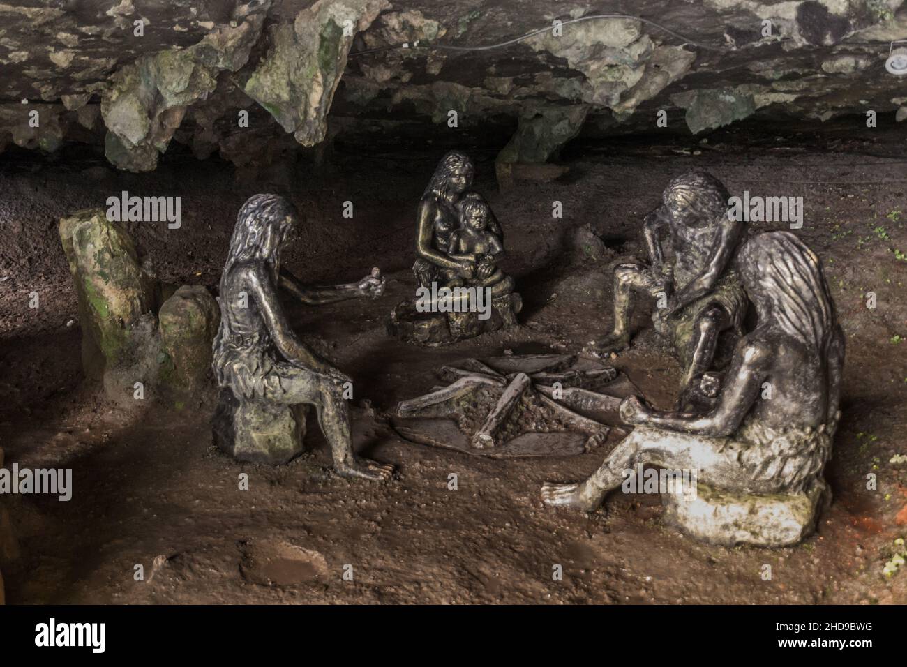Stone sculpture of a stone age people hi-res stock photography and ...
