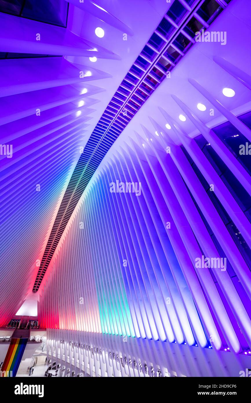 Reflection of the Pride flag colors on the inside walls of a bridge ...