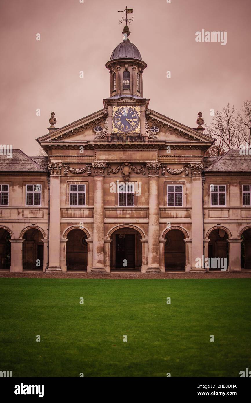 Vertical shot of the Emmanuel College in Cambridge, UK under the cloudy ...