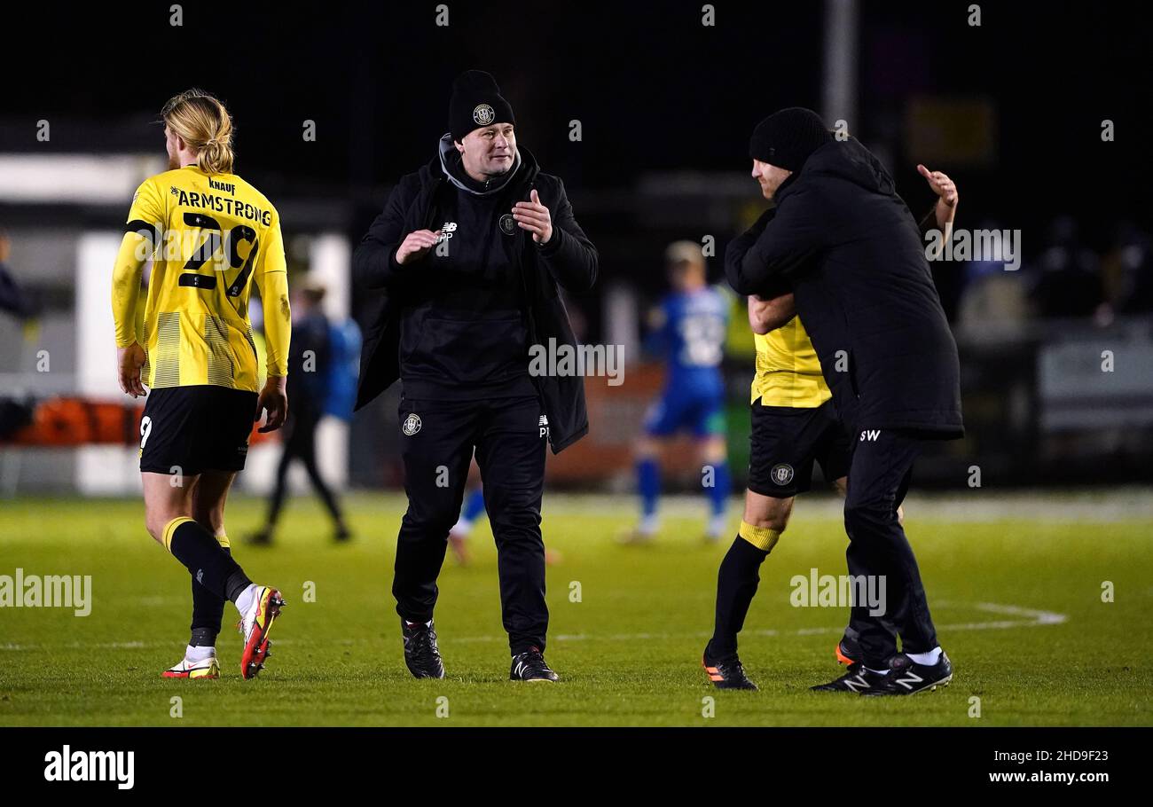 Harrogate Town goalkeeping coach Phil Priestley (centre) celebrates ...