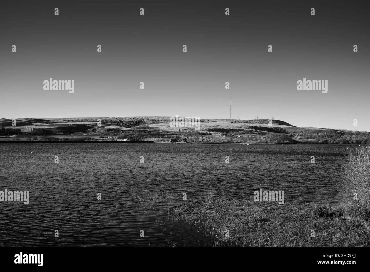 Grayscale of a Delph Reservoir looking across to Winter hill TV ...