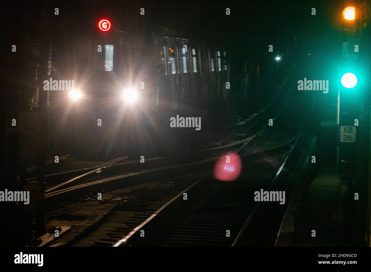 G subway train in a tunnel under Brooklyn NYC Stock Photo - Alamy