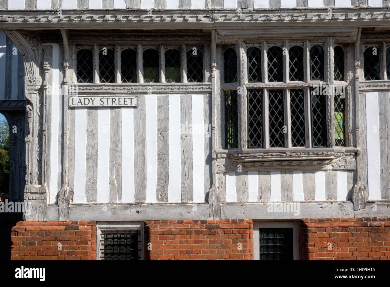 Close up of ancient timber and plaster work on guildhall Lavenham Stock ...