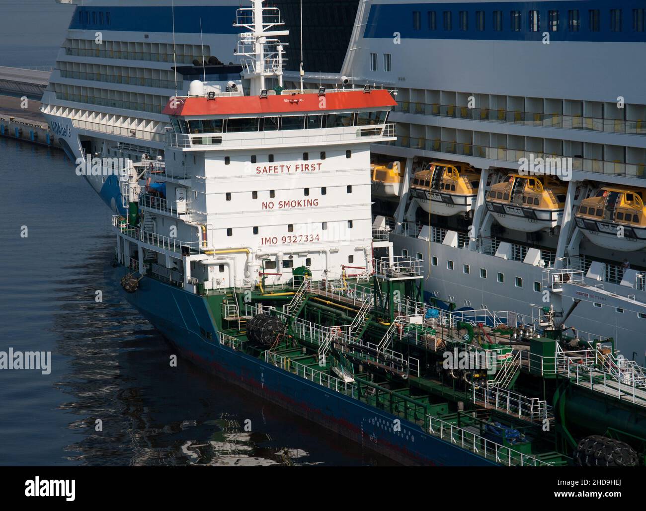 AIDA Bella cruise ship refuelling from refuelling barge or tanker, St ...
