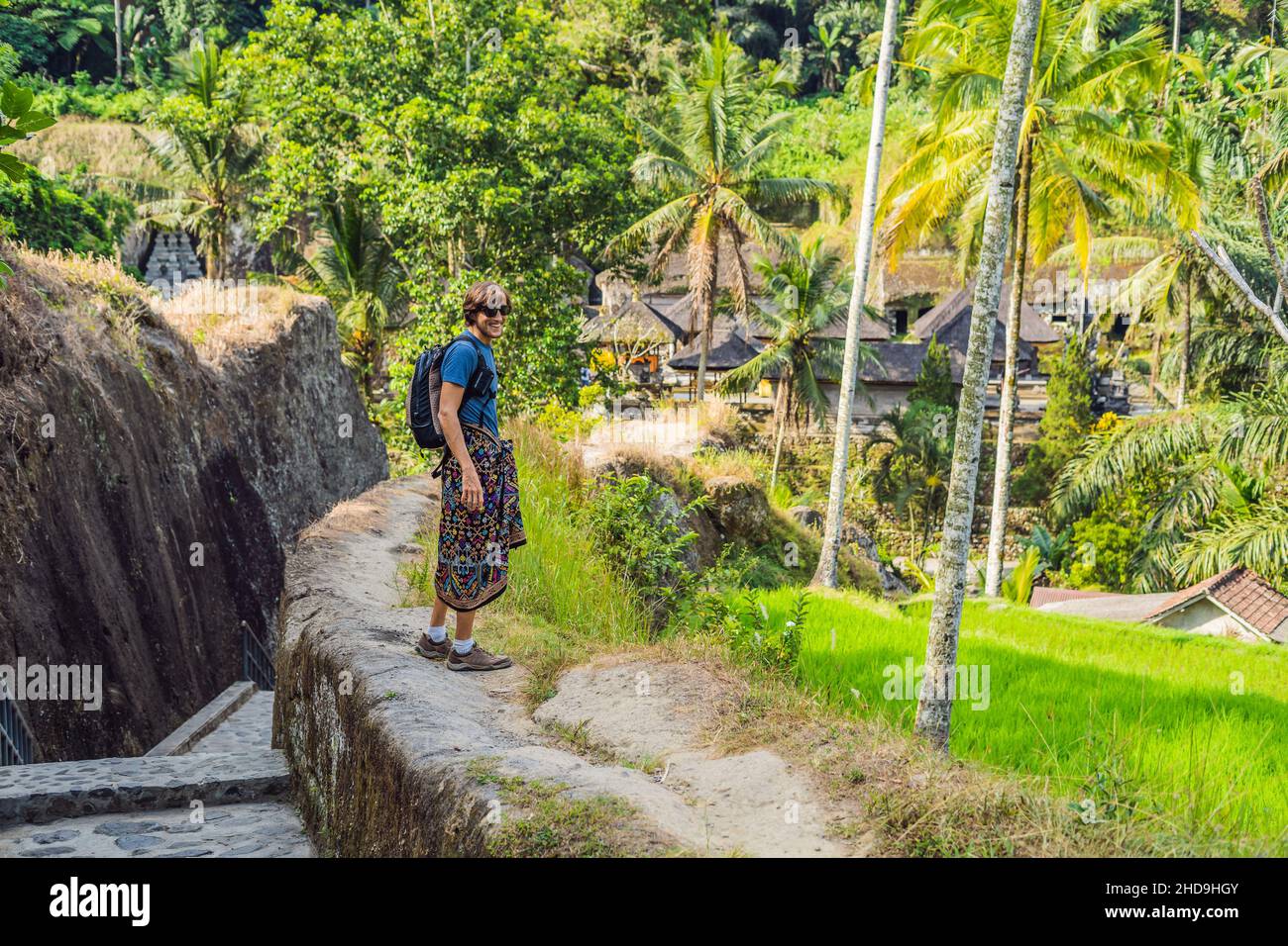 Man is a traveler in a rice paddy in Ubud, Bali, Indonesia Stock Photo ...