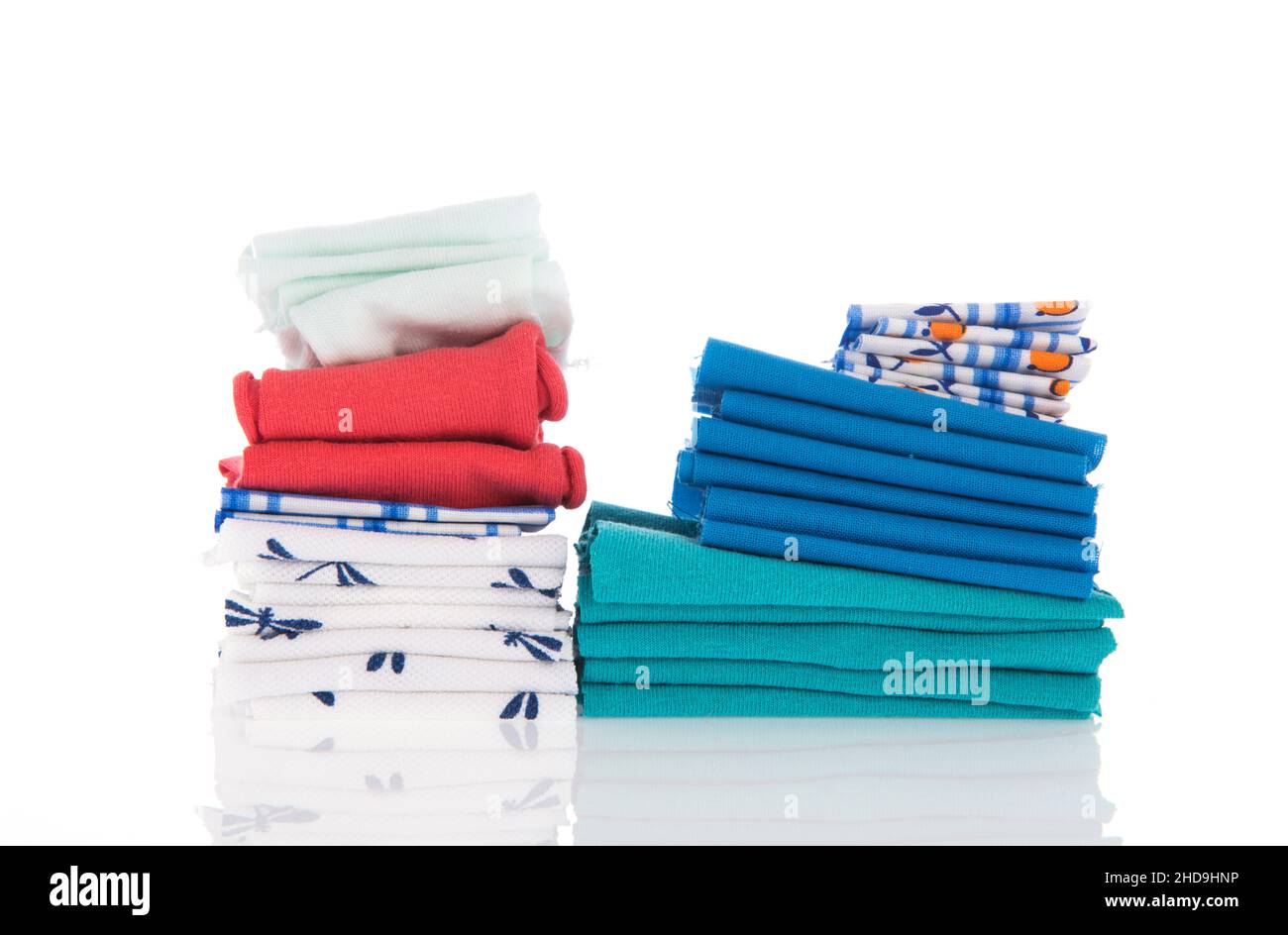 stacked bedding and linen isolated over white background Stock Photo ...