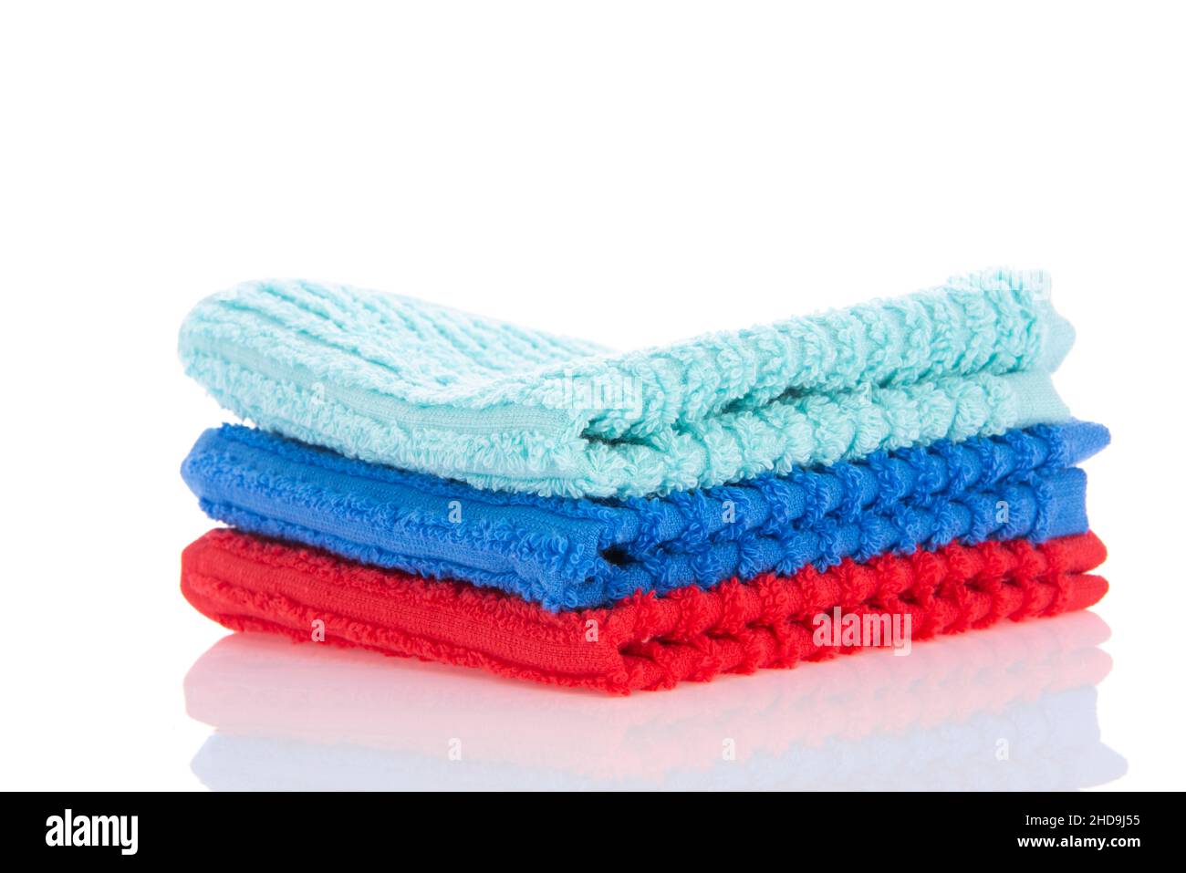 Colorful cleaning wipes in red and blue isolated over white background ...