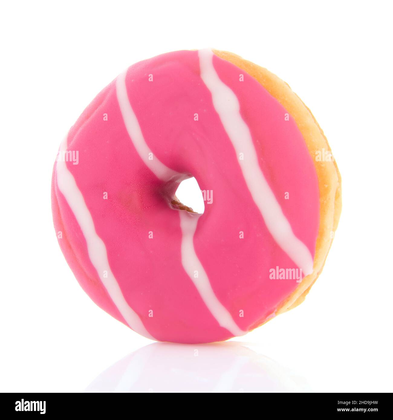 Striped pink donut standing on white background Stock Photo - Alamy
