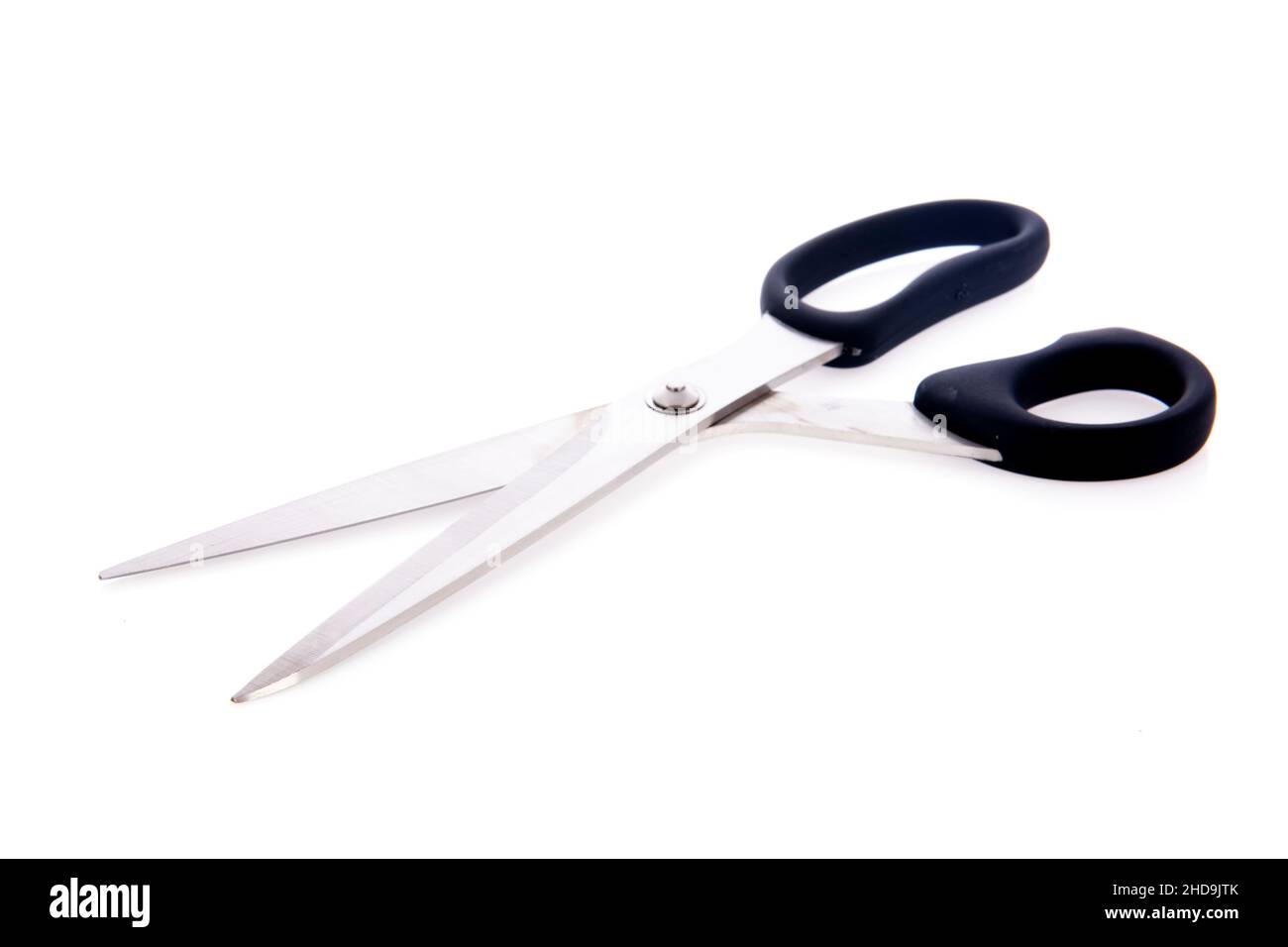 Closed black scissors isolated over white background Stock Photo - Alamy
