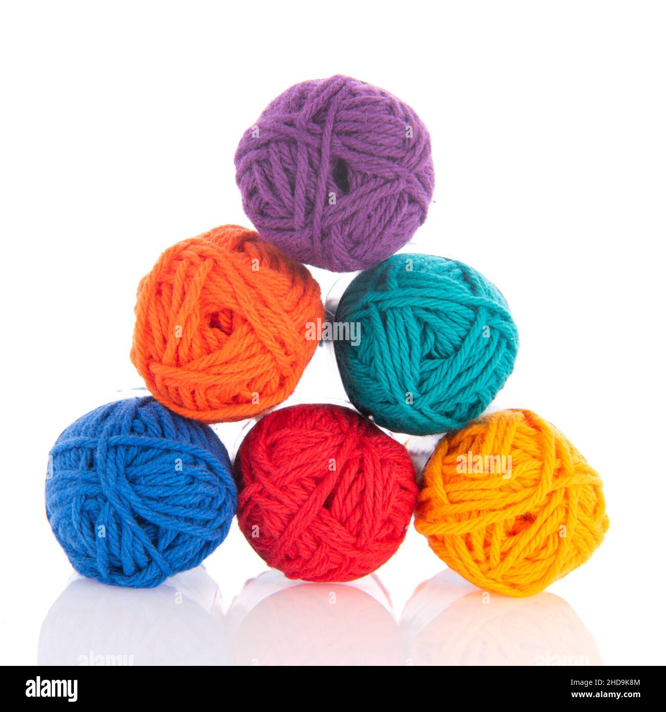 Blue knitting wool isolated over white background Stock Photo - Alamy