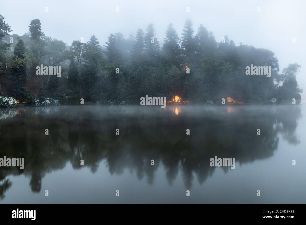 Lago Negro lake with fog, lights and reflection, Gramado, Rio Grande do ...