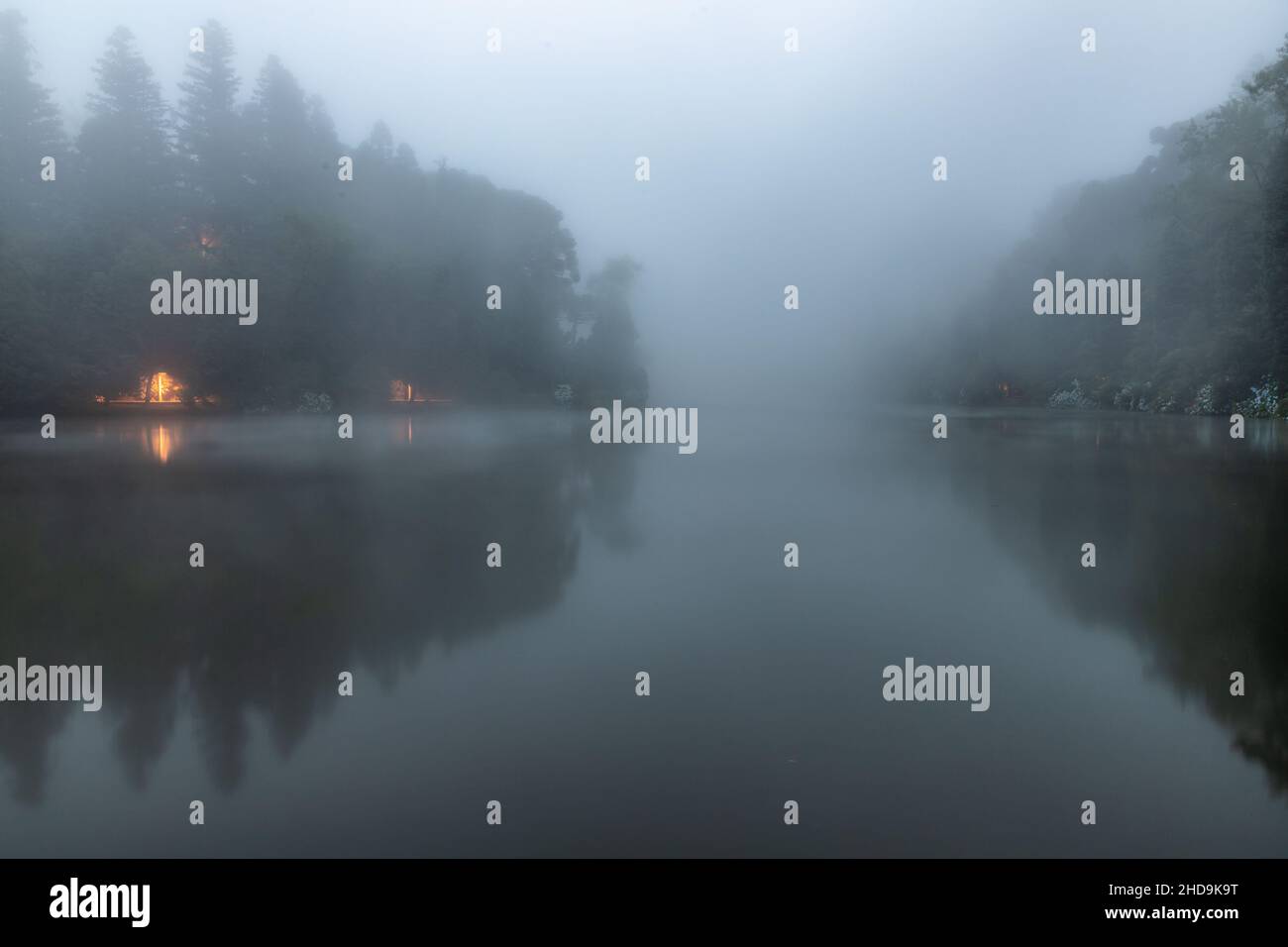 Lago Negro lake with fog, lights and reflection, Gramado, Rio Grande do ...