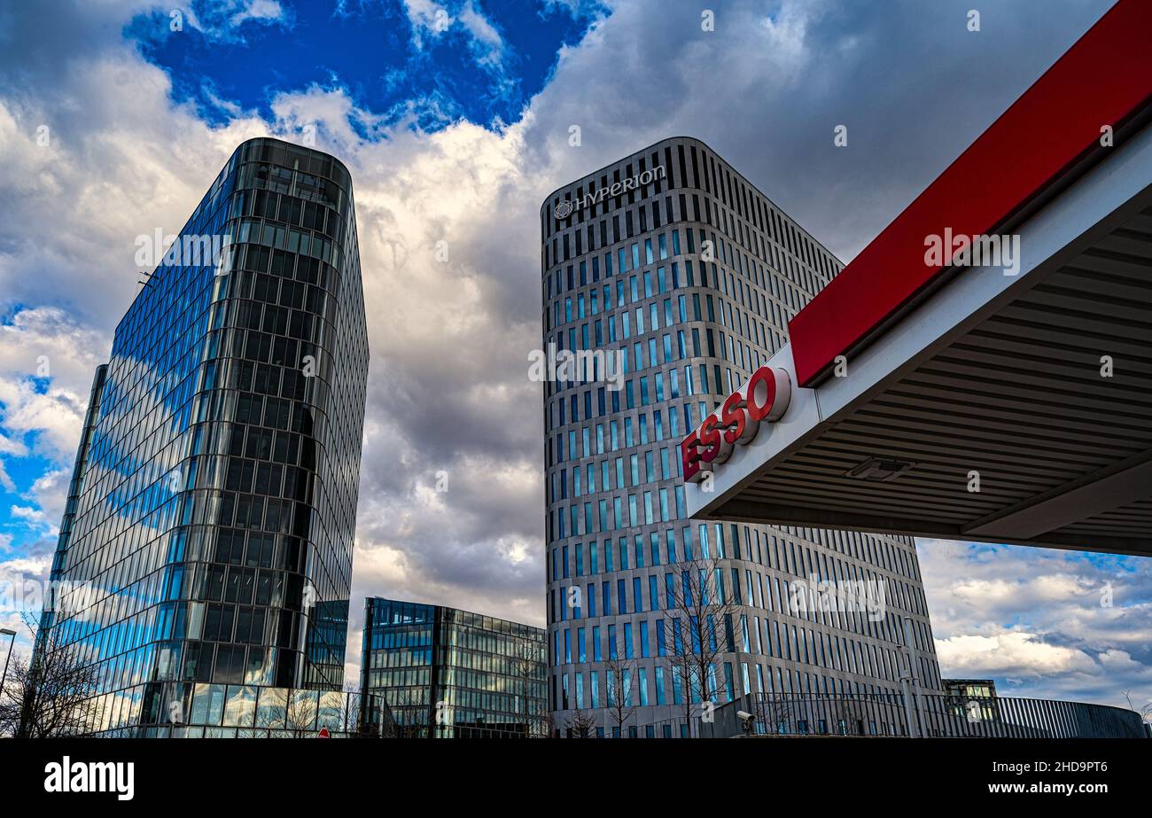 Esso fuel station in front of a hotel and office building Stock Photo ...