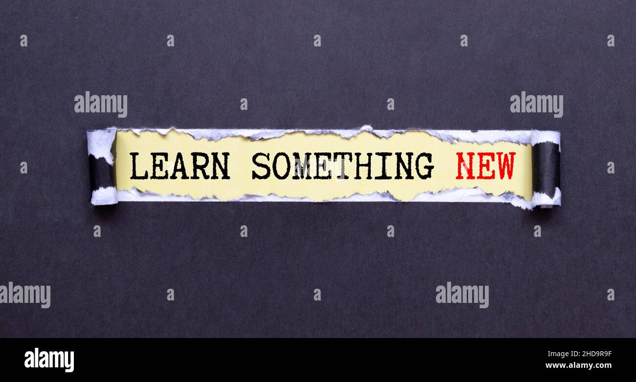 Learn something new text on brown envelope Stock Photo - Alamy