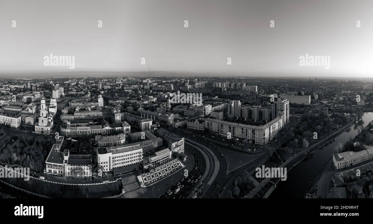 Grayscale panoramic aerial view above river Lopan embankment with Skver ...