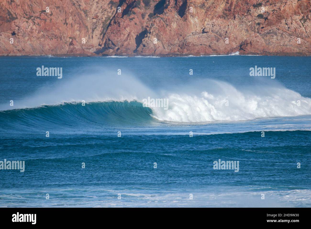 Perfect wave breaking in a beach. Surf spot Stock Photo - Alamy