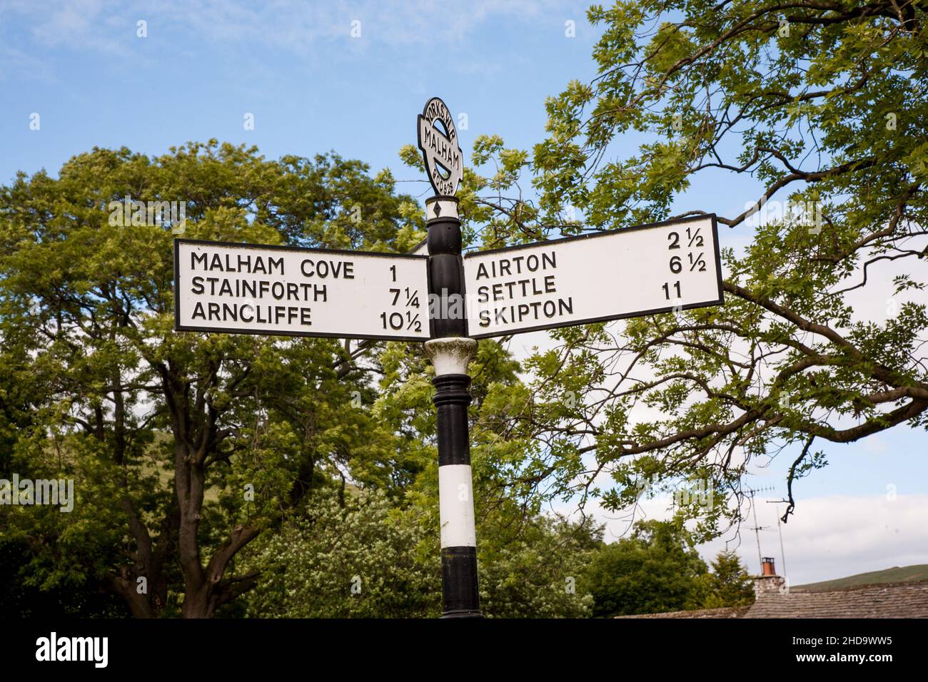 Quaint old signpost in Malham the Yorkshire Dales Stock Photo - Alamy