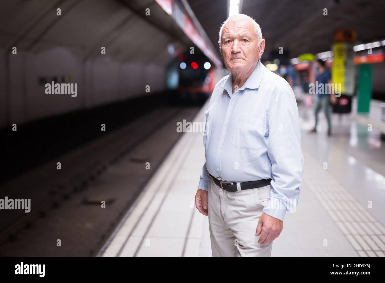 Old man in subway station Stock Photo - Alamy