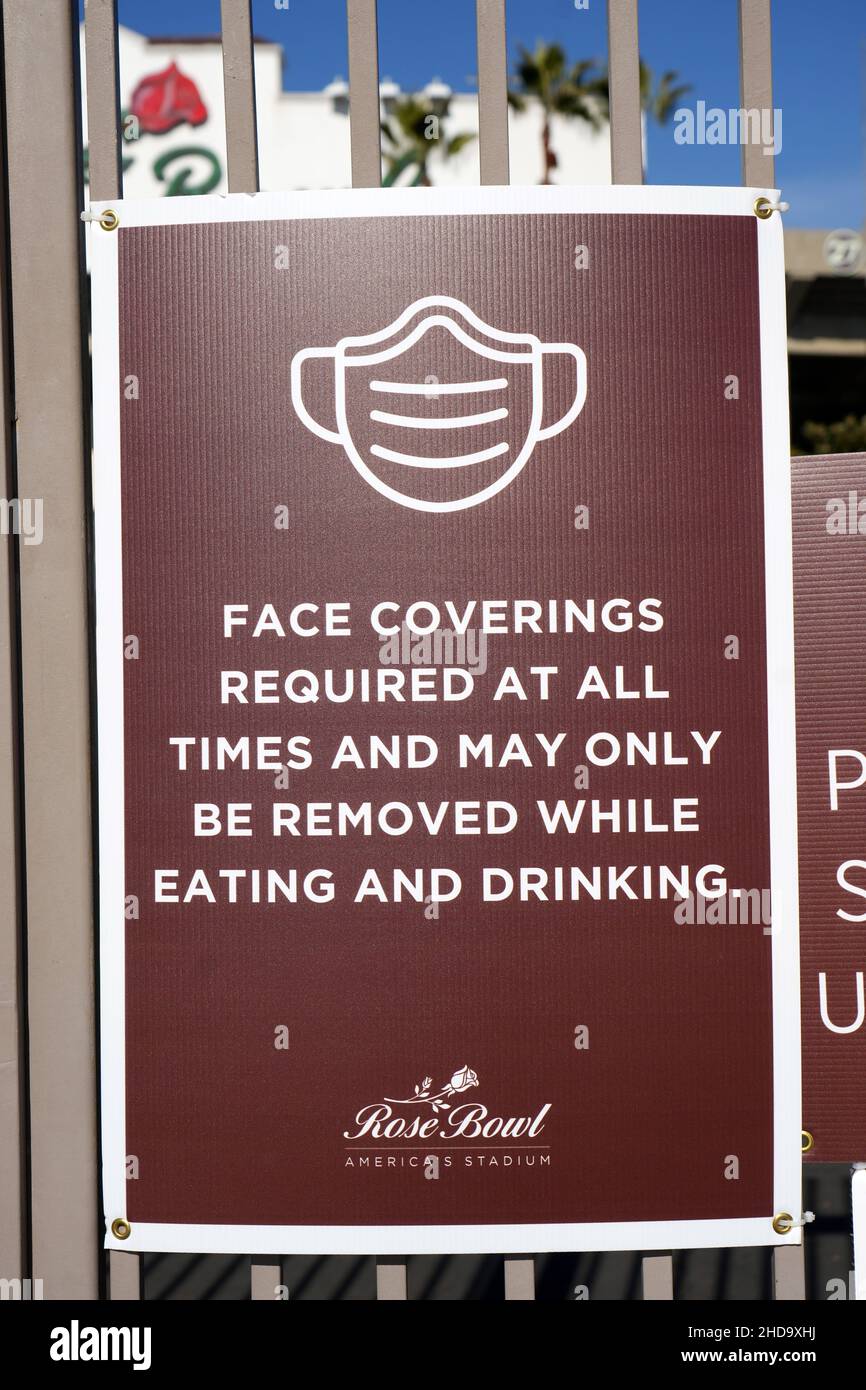 A Rose Bowl Game COVID-19 face mask and health advisory sign, Tuesday ...