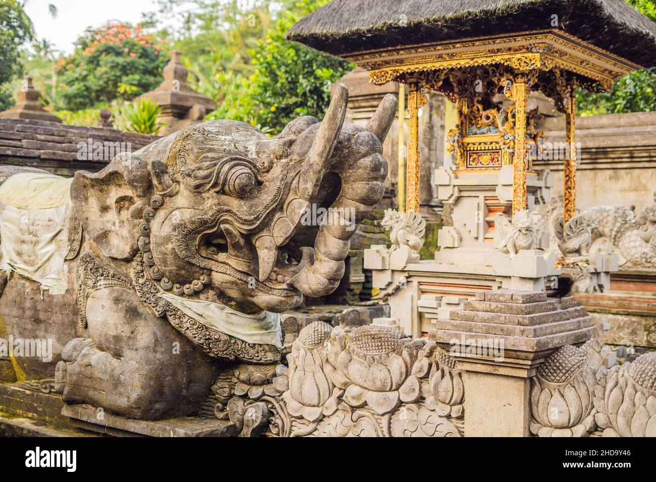 Stone balinese mossy statue Bali island Indonesia Stock Photo - Alamy