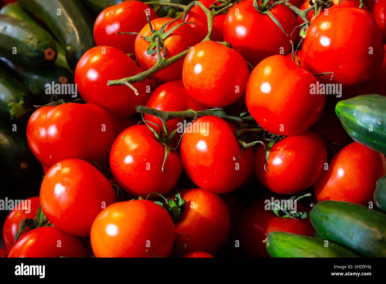 Boxes with tomatoes in store Stock Photo - Alamy