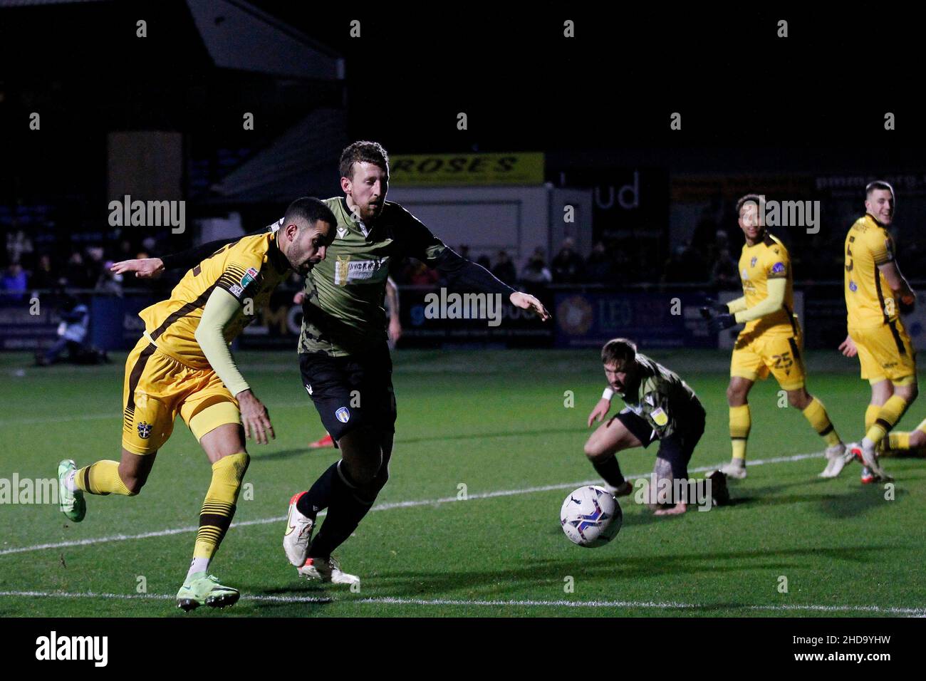 Sutton, UK. 04th Jan, 2022. Tommy Smith of Colchester United and Joe ...