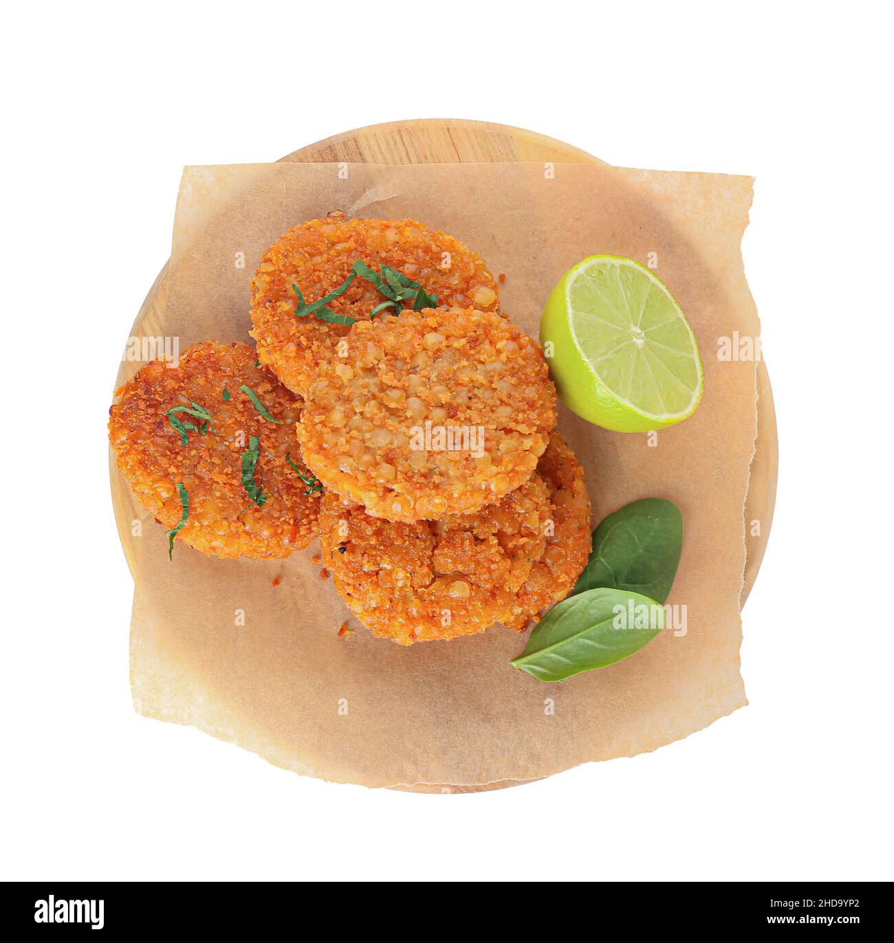 Board with tasty lentil cutlets on white background Stock Photo - Alamy