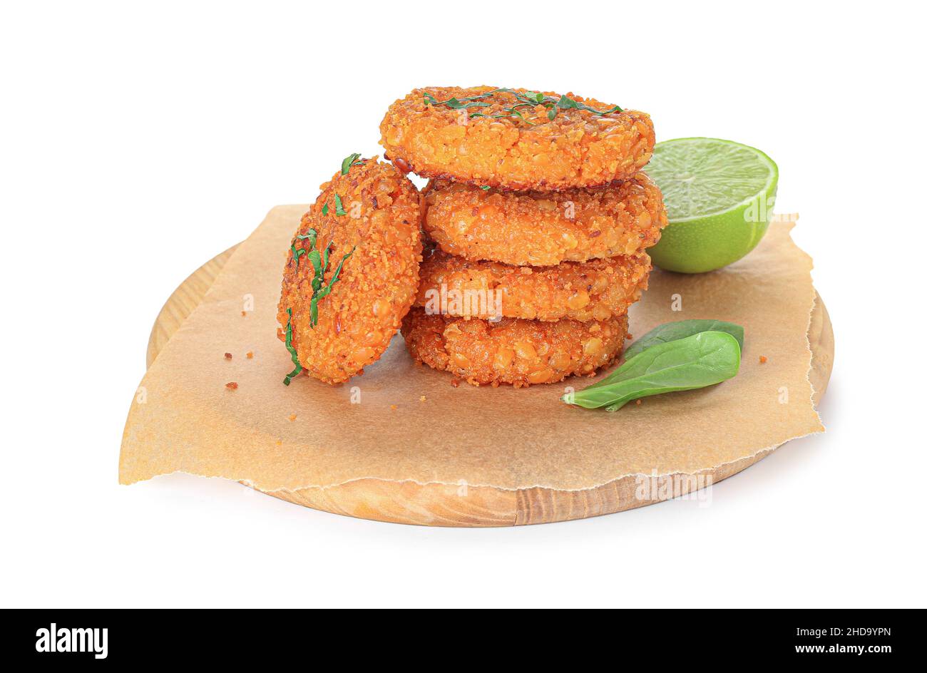 Board with tasty lentil cutlets on white background Stock Photo - Alamy