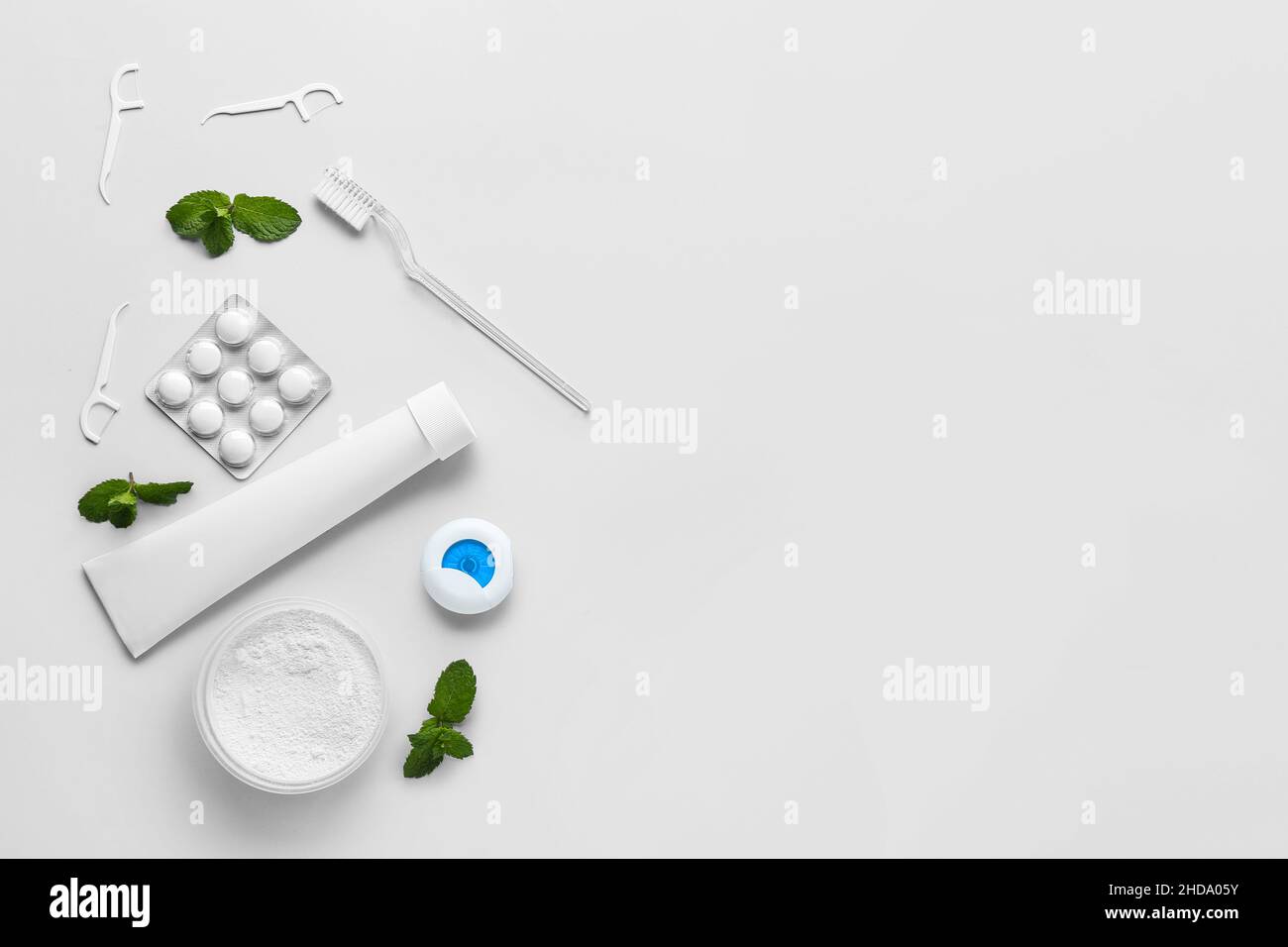 Set of dental hygiene on light background Stock Photo - Alamy