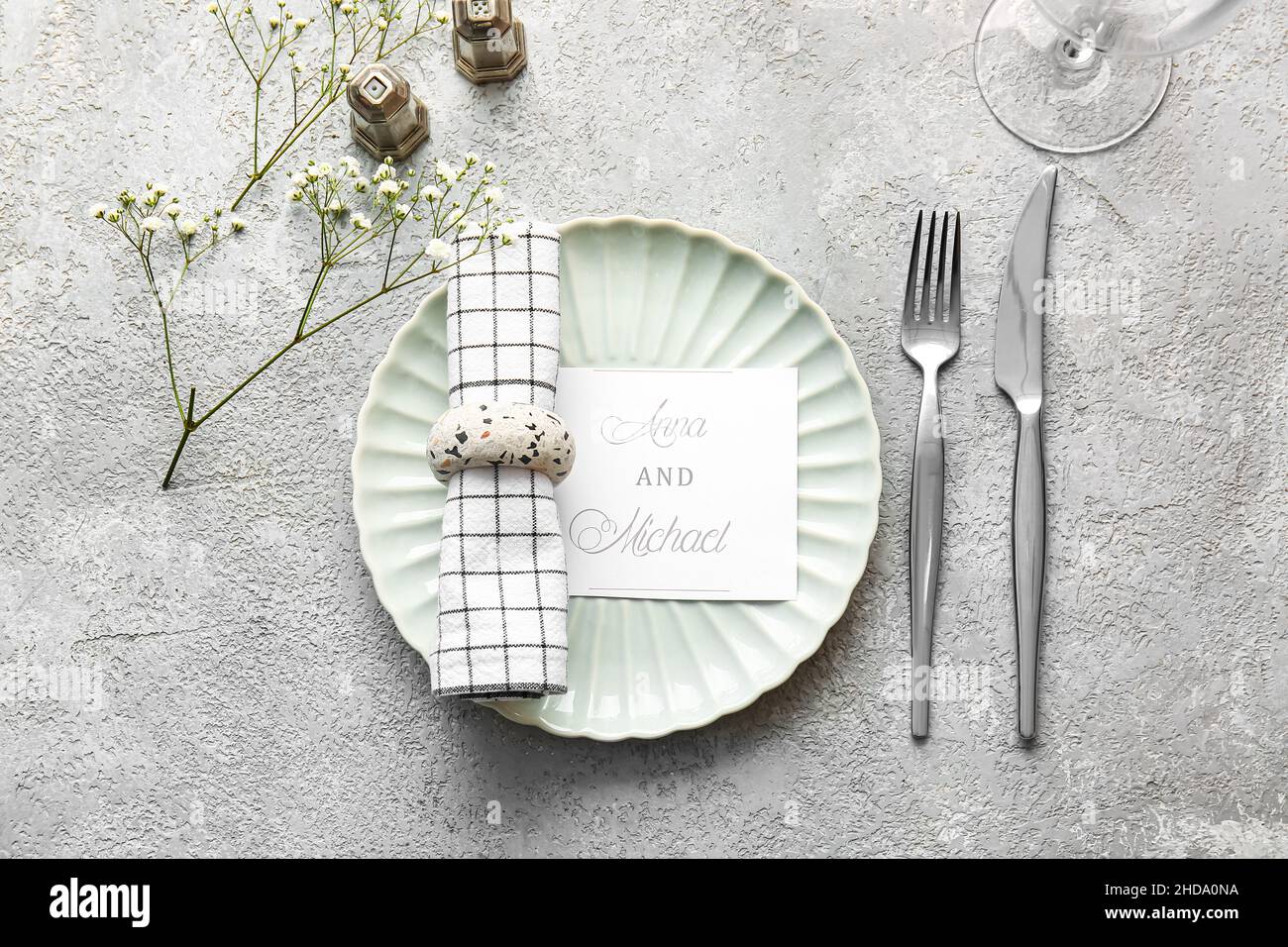 Beautiful table setting with wedding invitation on light background ...