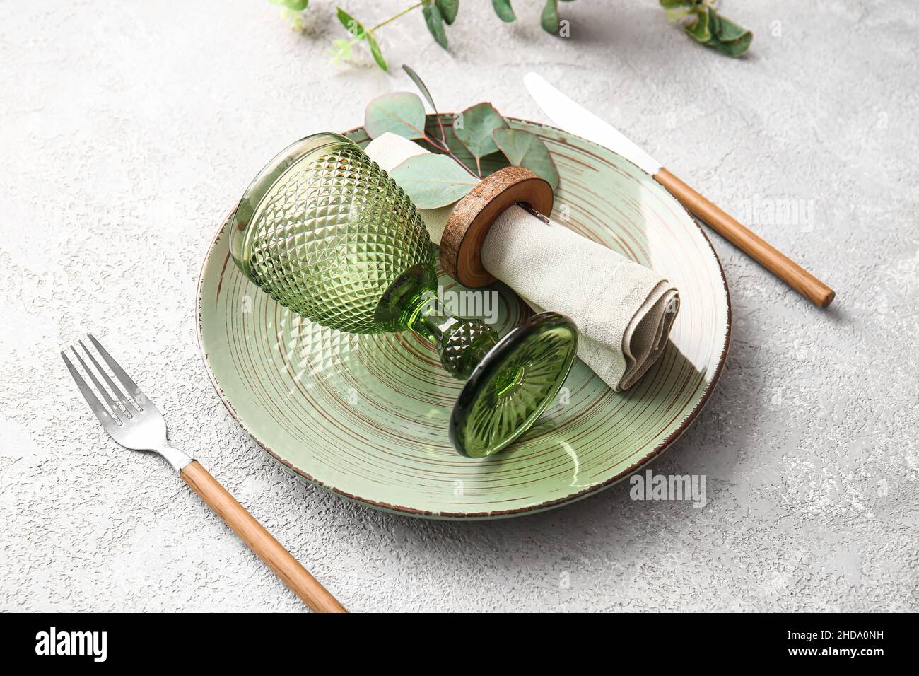 Beautiful table setting for wedding on light background Stock Photo - Alamy