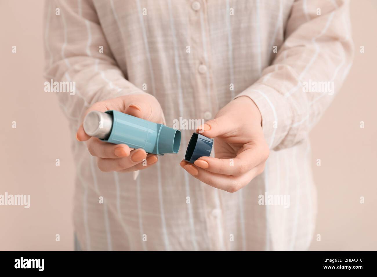 Woman hands holding inhalation hi-res stock photography and images - Alamy