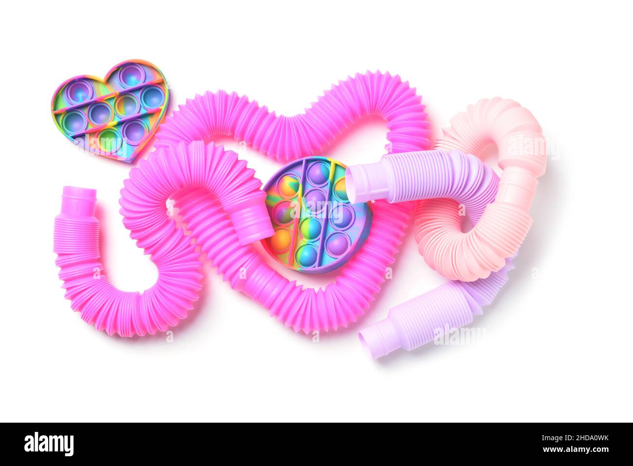 Colorful Pop Tubes and Pop it fidget toys on white background Stock ...