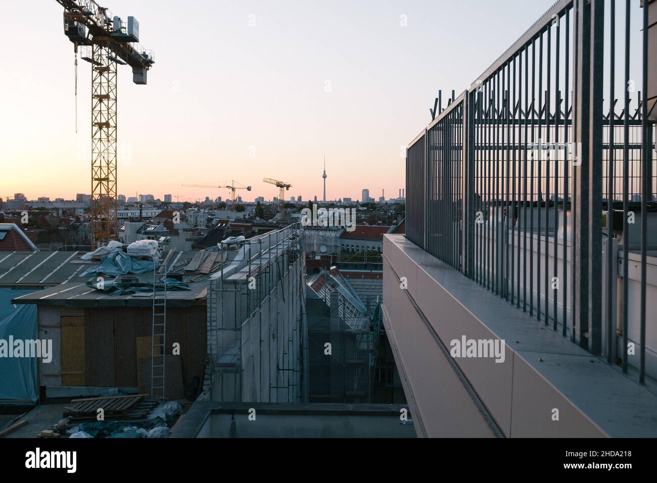 Shot of many of buildings from the top in time of sunset with ...
