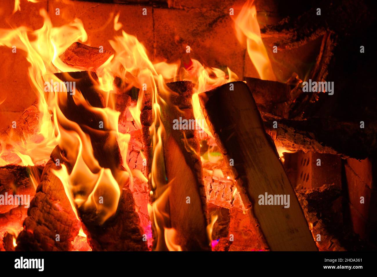 flame. Fire and flames Sparks and flames close-up. Fireplace with logs ...