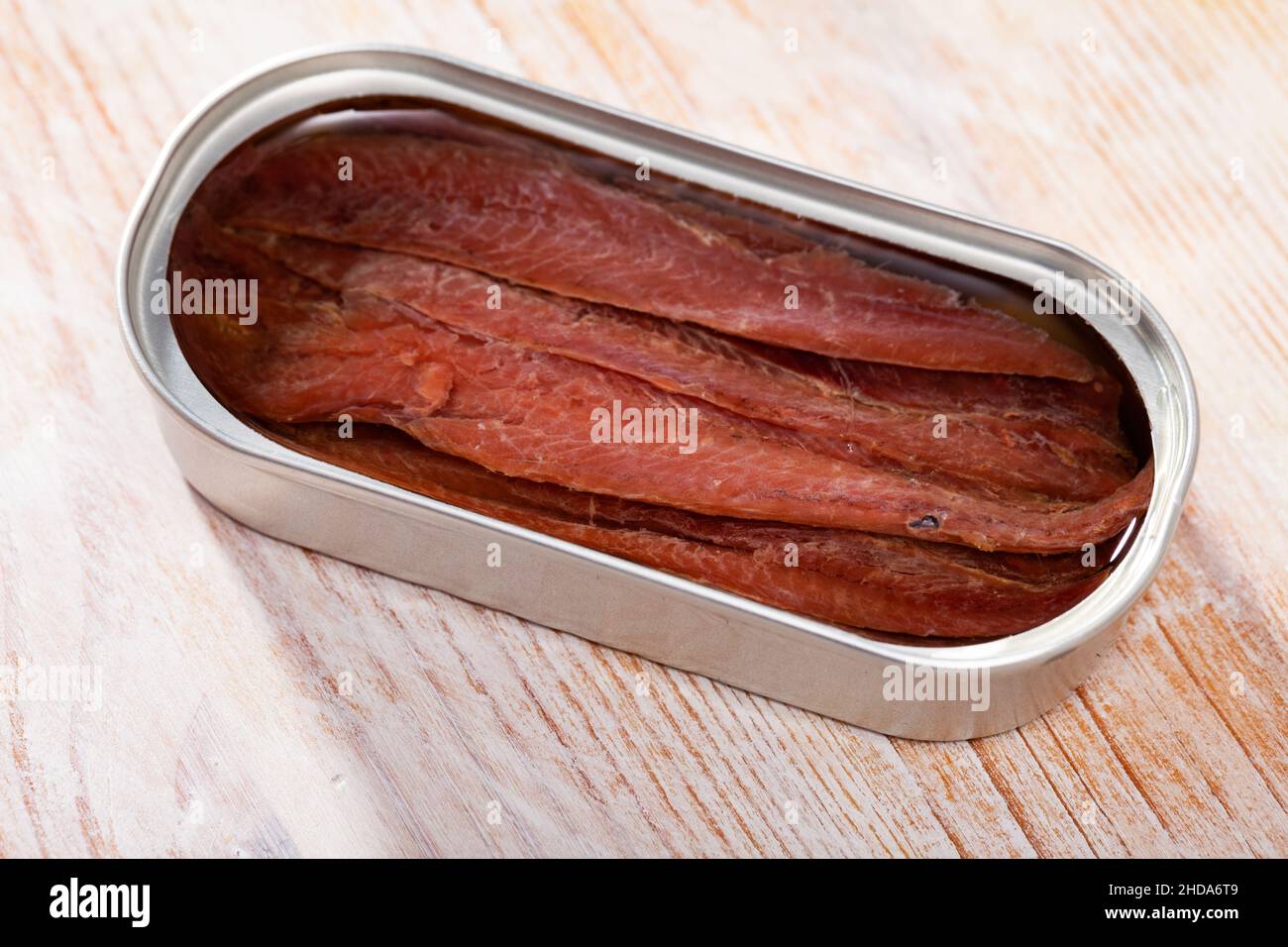 Opened tin can of anchovy fillet Stock Photo - Alamy
