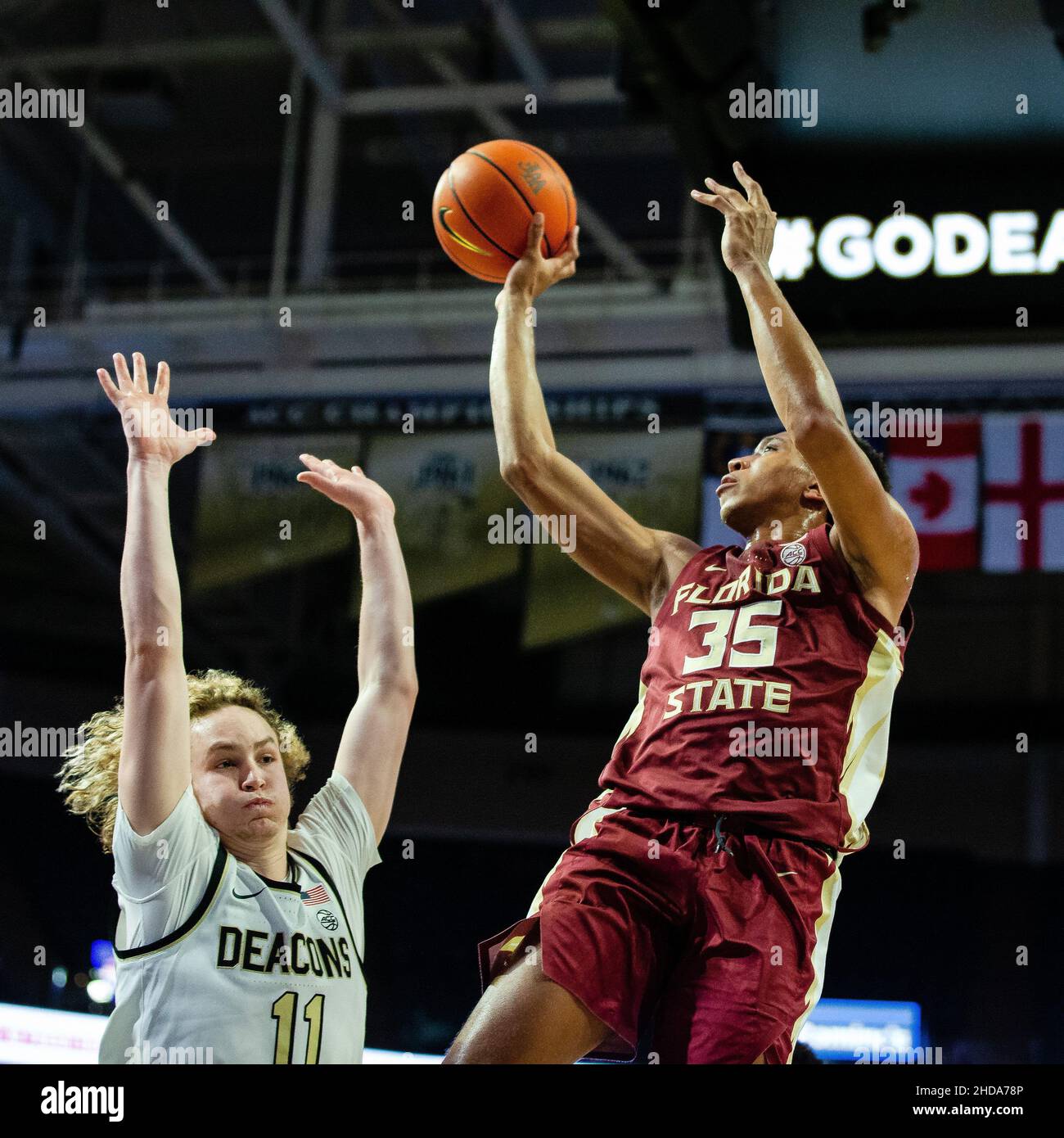 Winston-Salem, NC, USA. 4th Jan, 2022. Wake Forest Demon Deacons guard Carter Whitt (11) guards ...