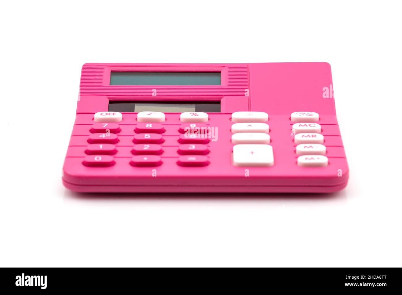 Pink calculator on white background Stock Photo - Alamy